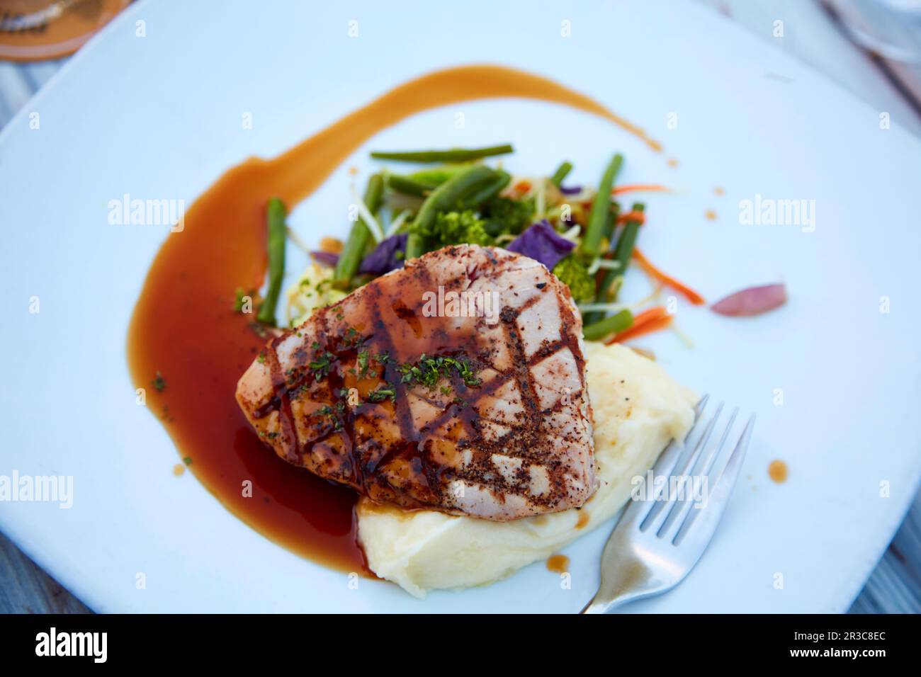Grilled tuna steak with mashed potatoes Stock Photo - Alamy