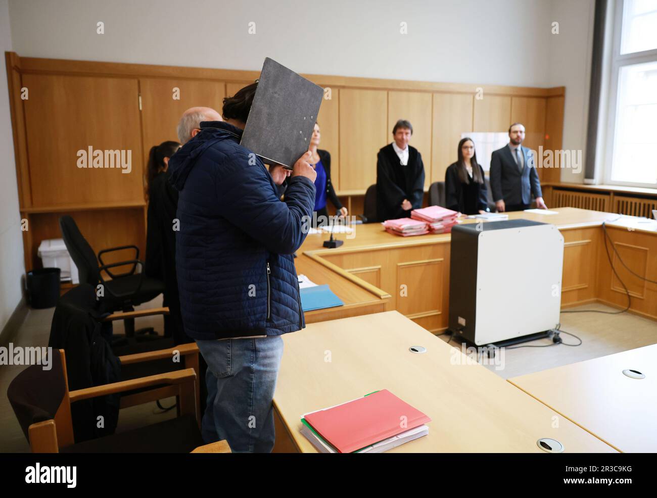 Hamburg, Germany. 23rd May, 2023. The defendant (l), his lawyer Peter ...