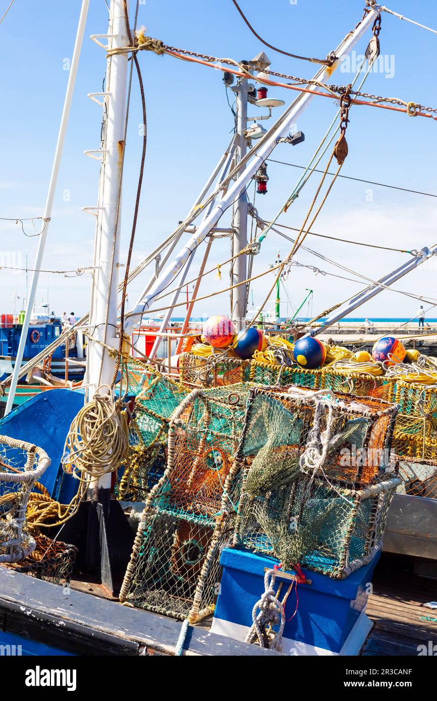 Crayfish nets and traps on a small fishing boat Stock Photo - Alamy