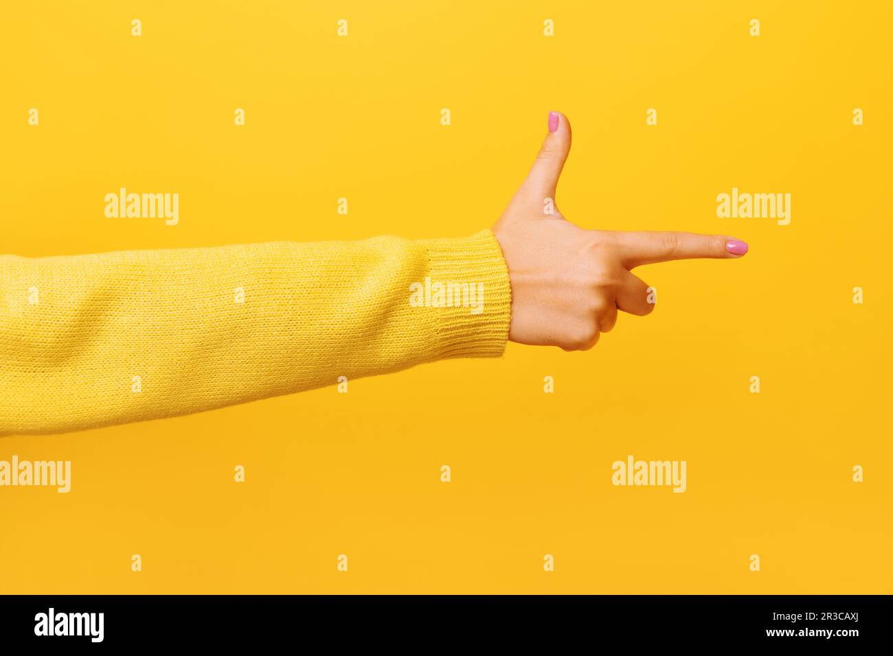 Yellow hand pointing direction hi-res stock photography and images - Alamy