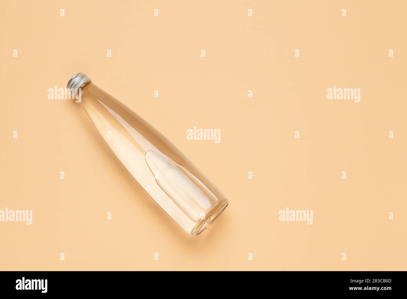 Water bottle flat lay top view on color paper background Stock Photo ...