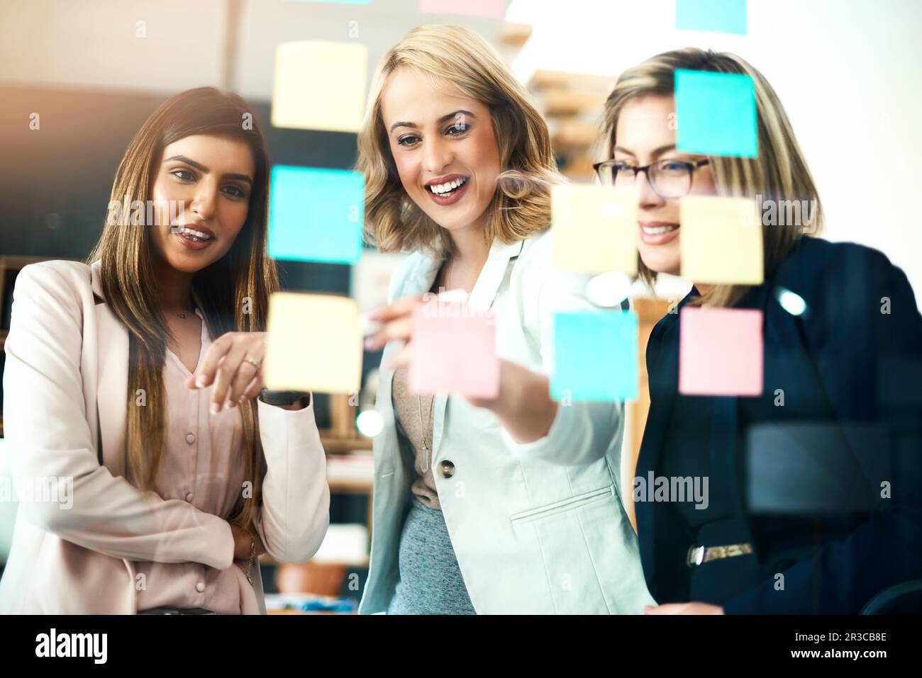 Business women, brainstorming and planning schedule of target, team ...