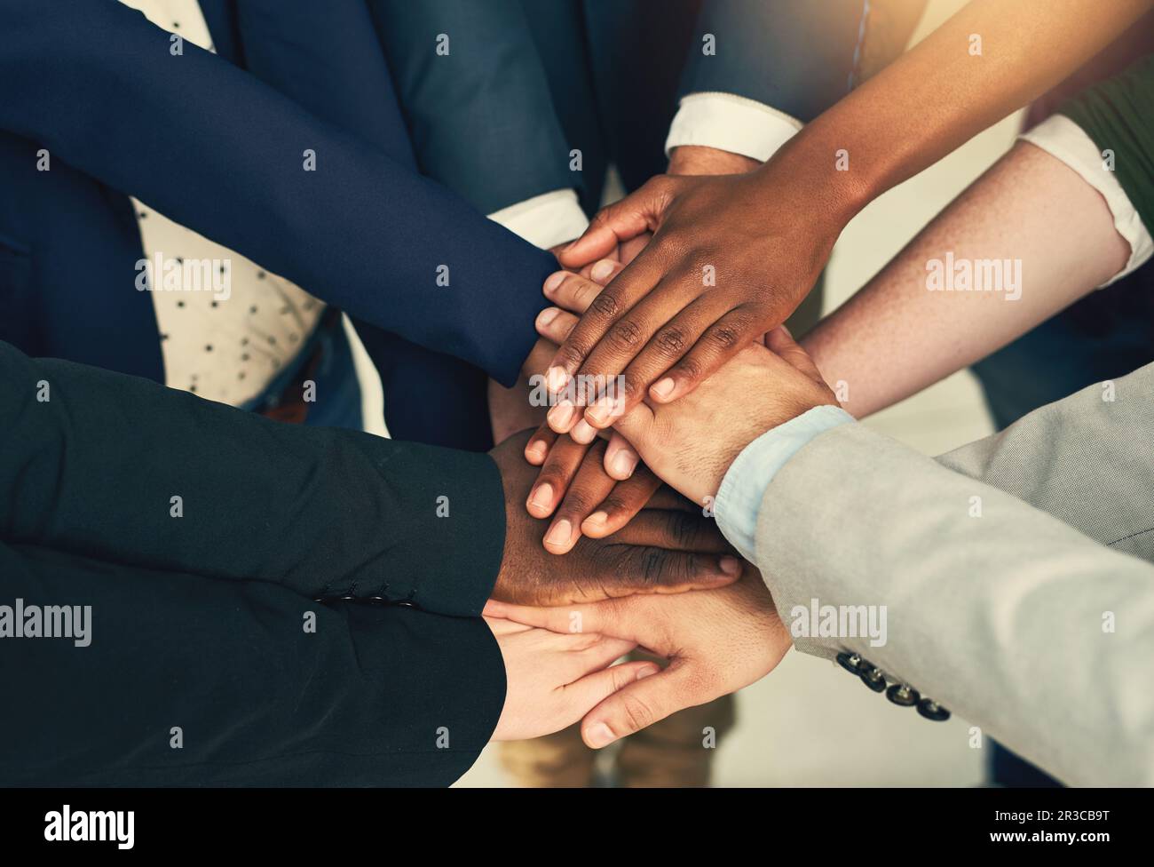 Teamwork, diversity and hands stack of business people in office for ...