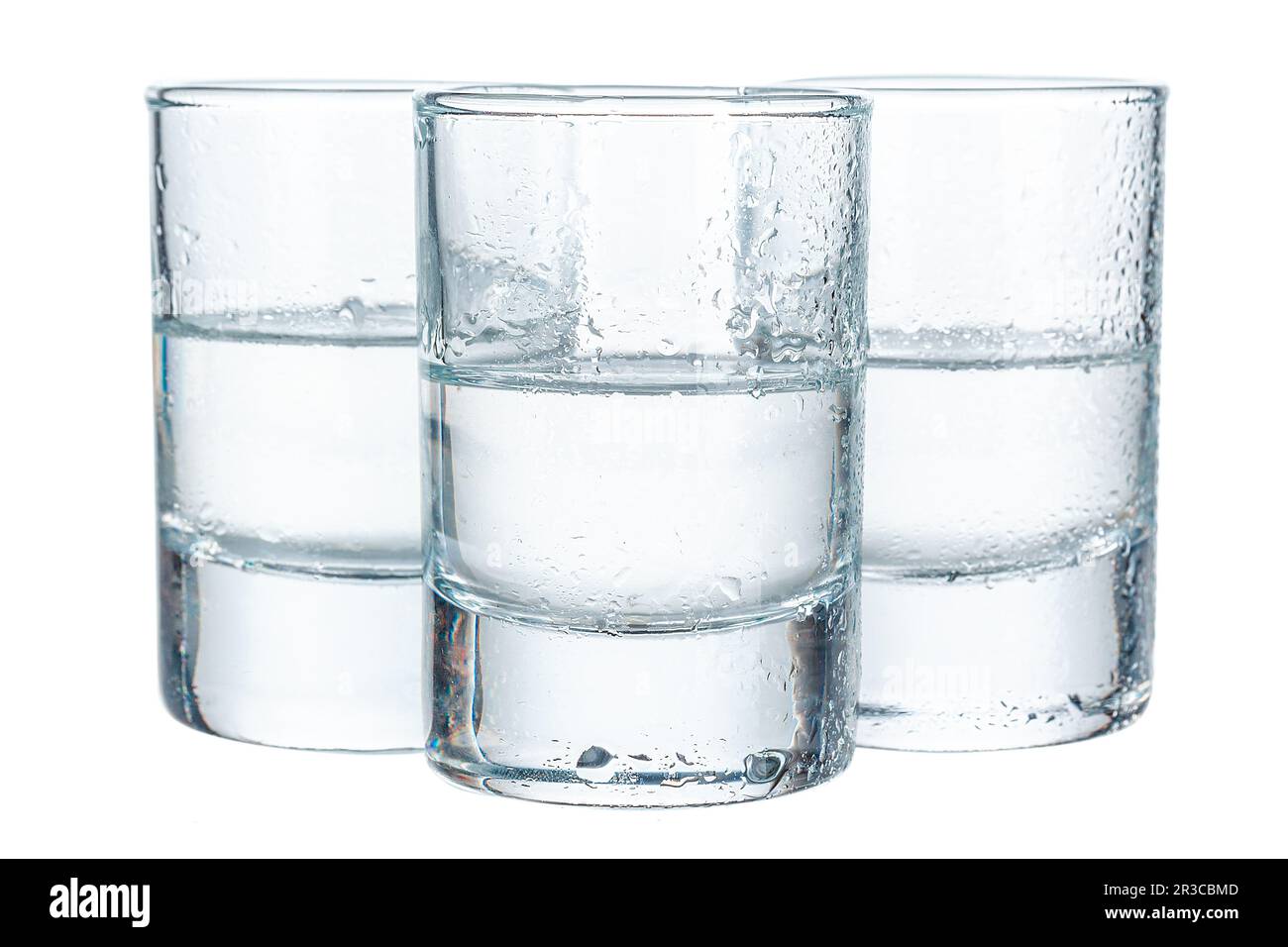 Glass of vodka isolated on white background Stock Photo - Alamy