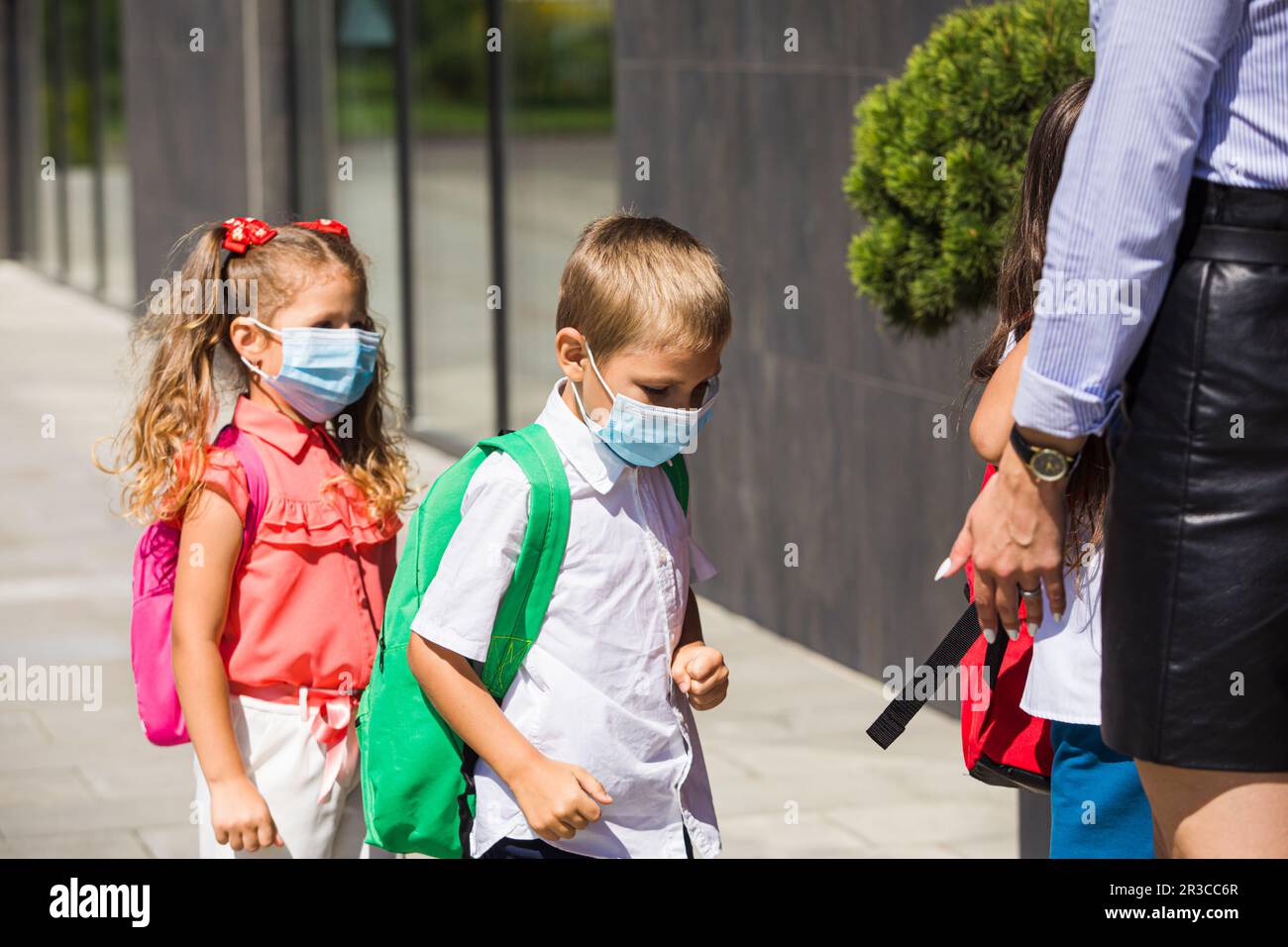 Returning students to school in compliance with safety rules Stock ...