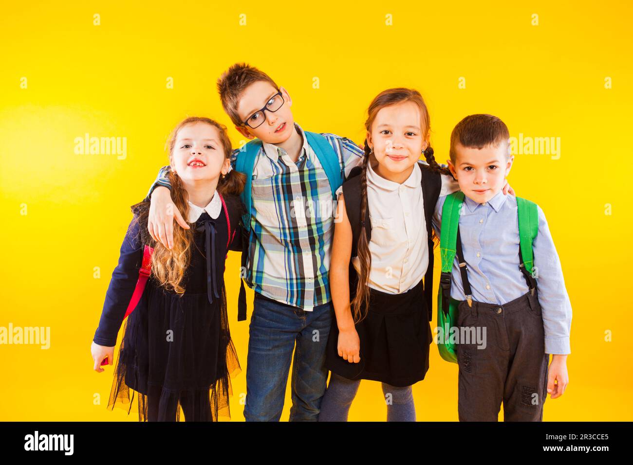 The classmates friends stand together and look at the camera Stock ...
