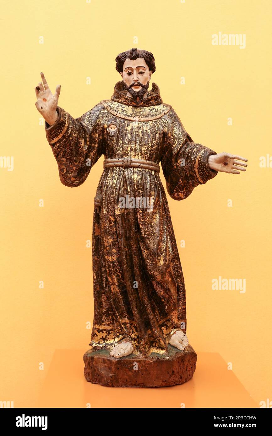 Evora, Portugal- October 10, 2022: Gilded wood polychrome figure of St ...