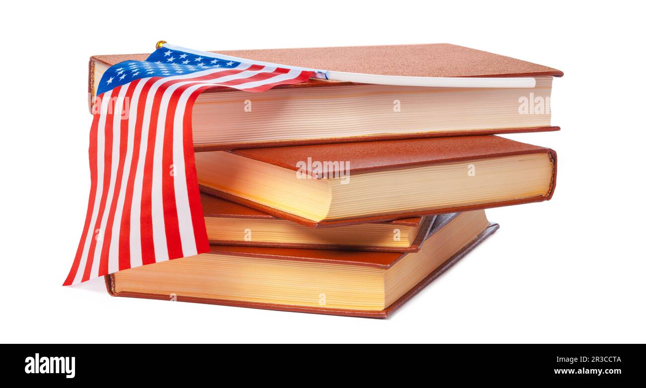 USA flag with pile of books isolated on white background Stock Photo ...