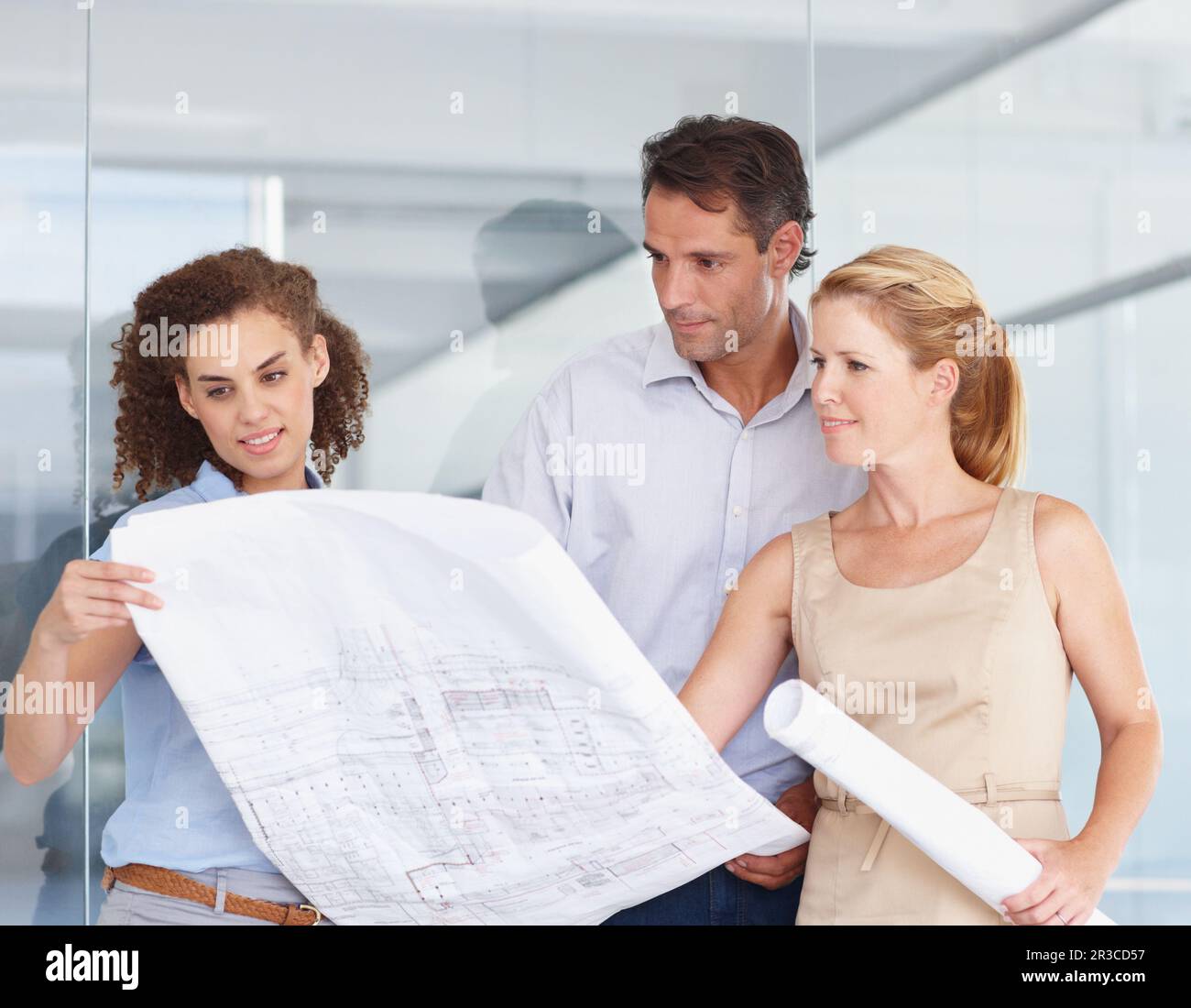 Architect team, blueprint and planning in construction, meeting or ...