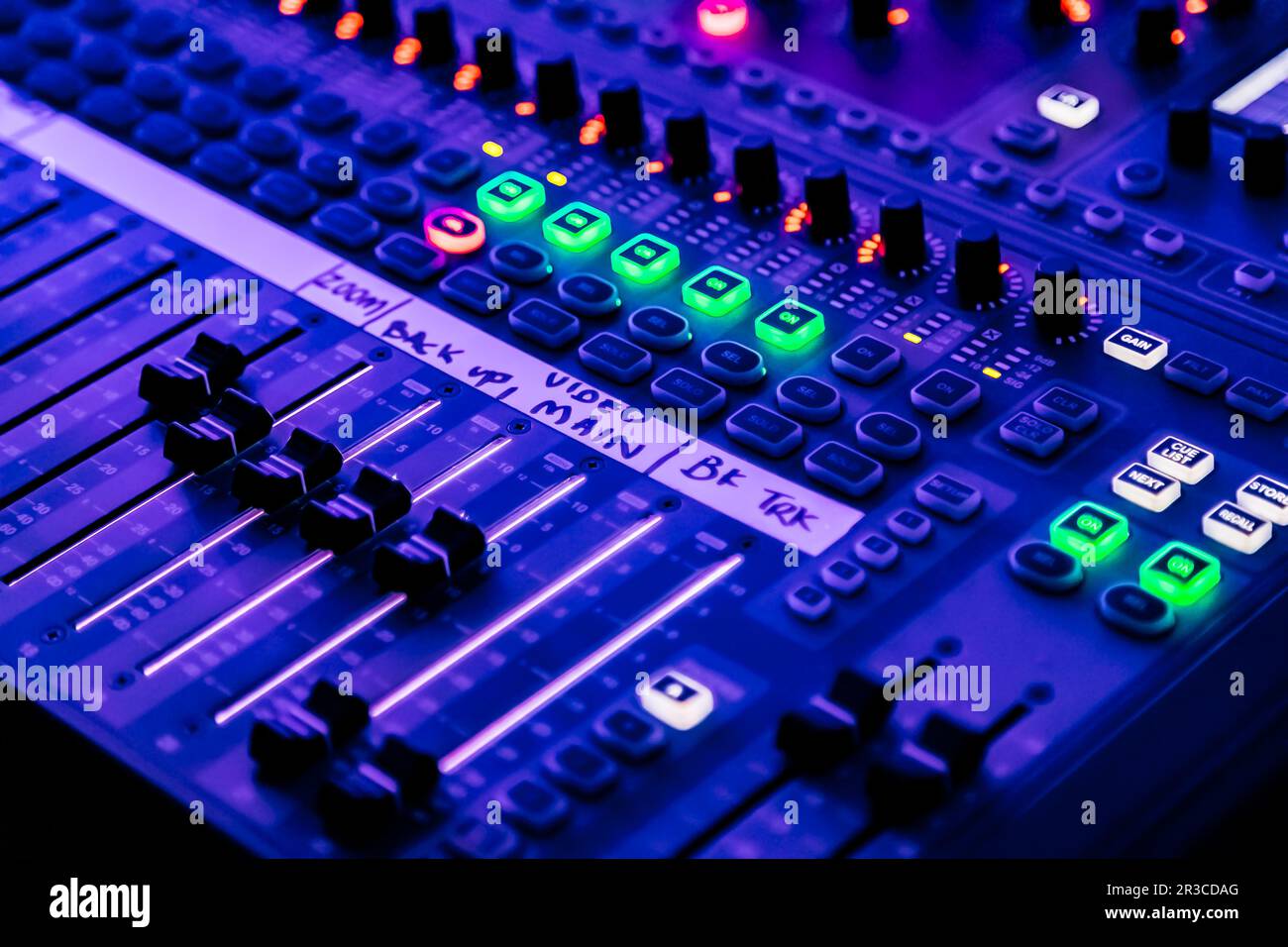 Sliders and button on Audio Mixing Desk at live event Stock Photo - Alamy