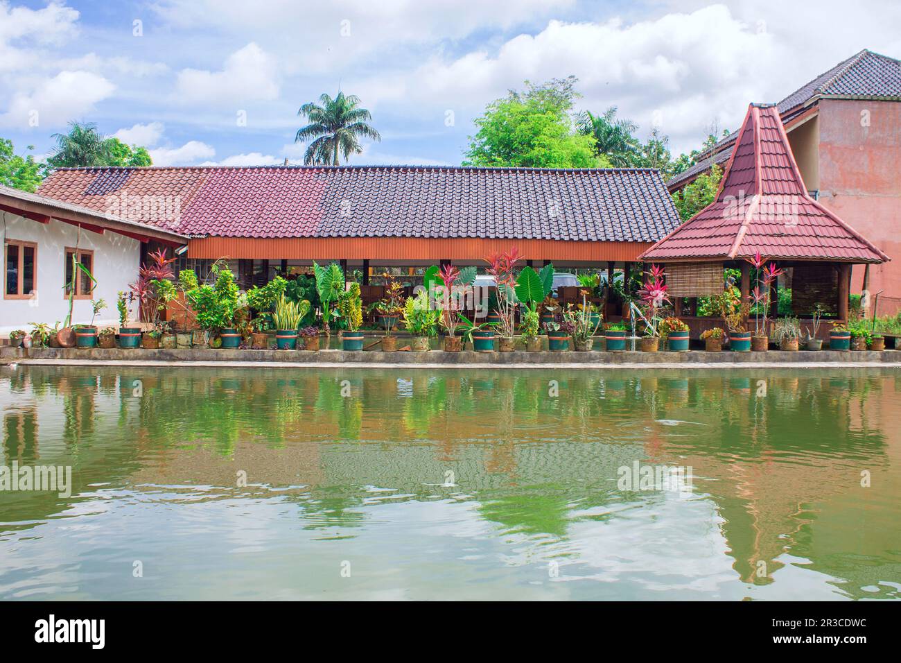 Restaurant in front of fish pond with blue sky, tasikmalaya, west java ...