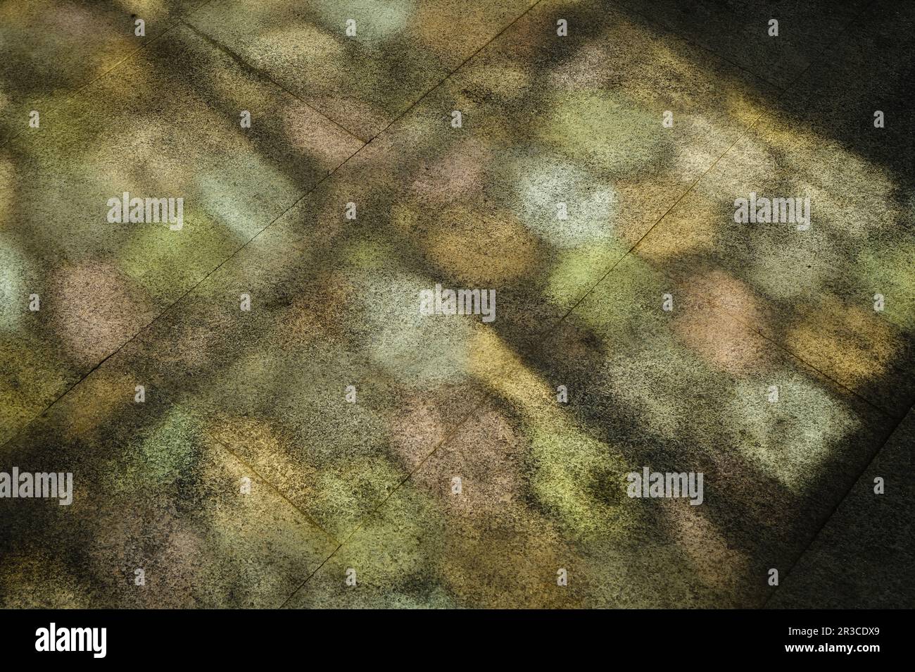 Colorful window shades casting patterns and hues, filtering sunlight ...