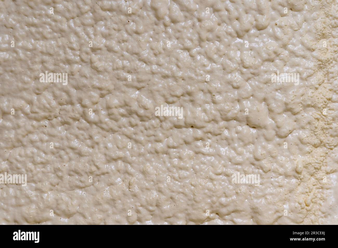 Close-up of the walls of the building insulated with polyurethane foam ...