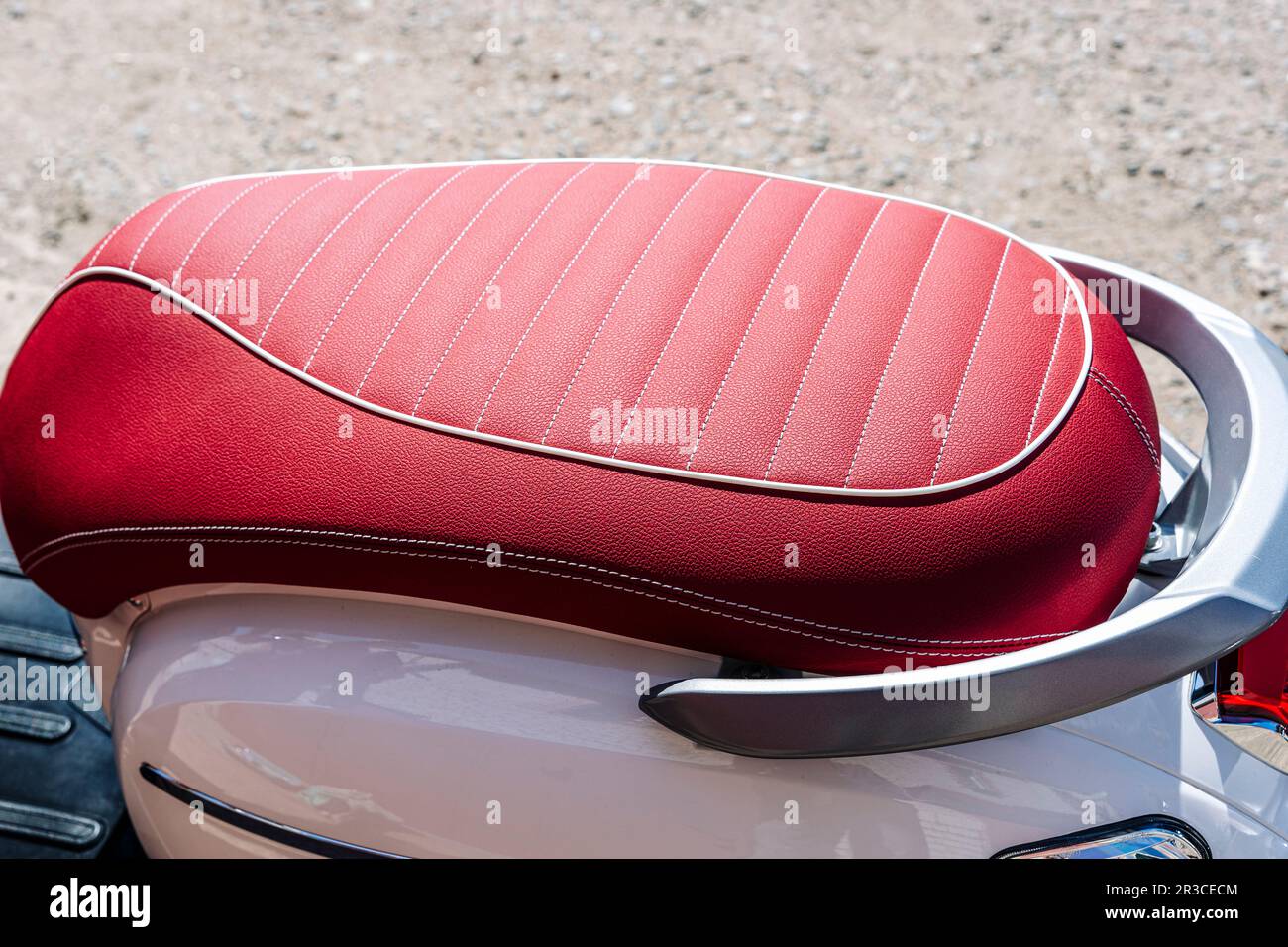 gorgeous red leather motorcycle seat with white stitching Stock Photo ...