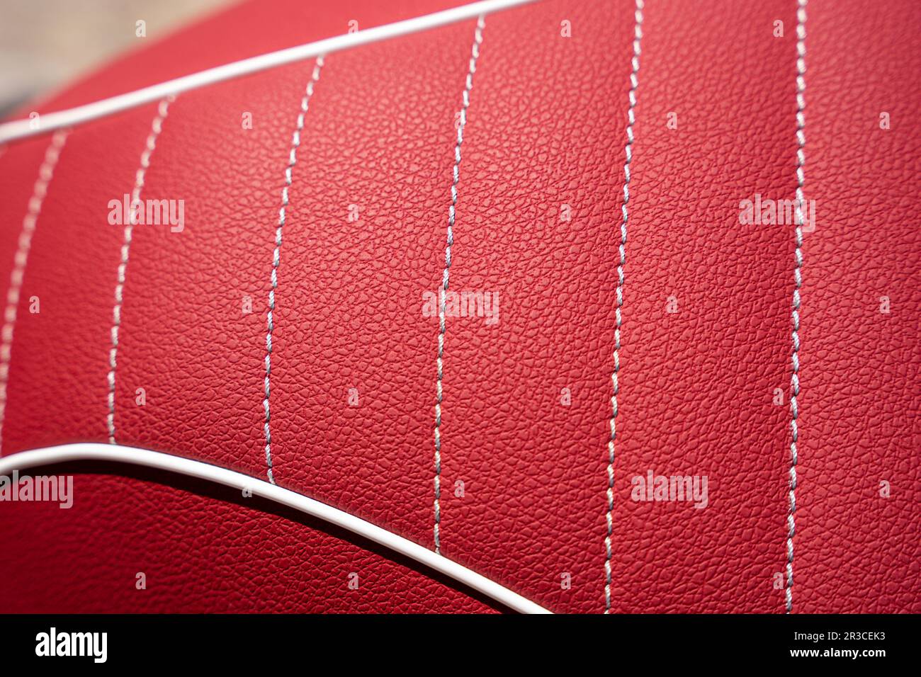 gorgeous red leather motorcycle seat with white stitching Stock Photo ...