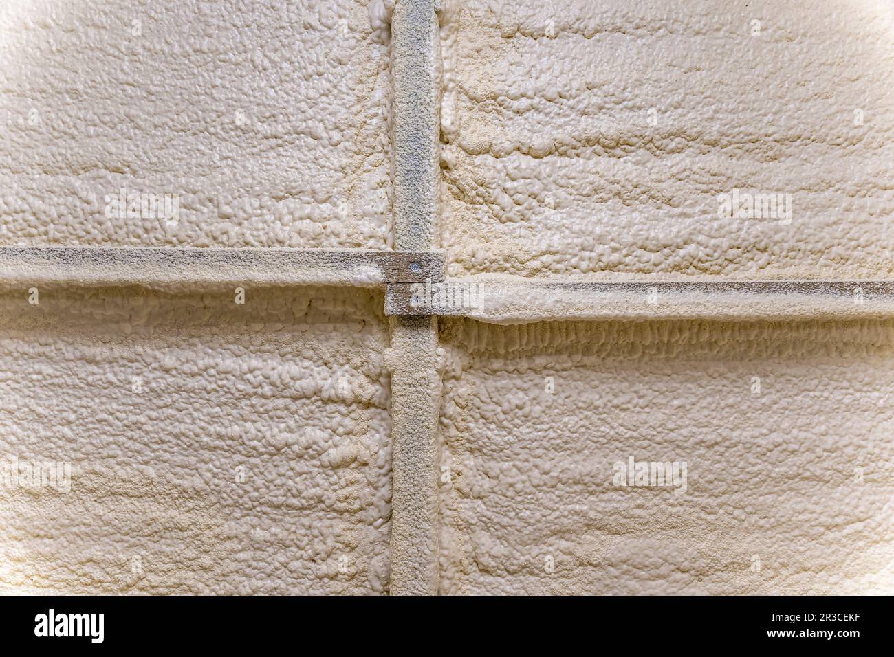 Close-up of the walls of the building insulated with polyurethane foam ...
