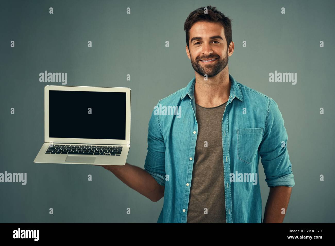 Happy man, laptop and mockup screen for advertising or marketing ...