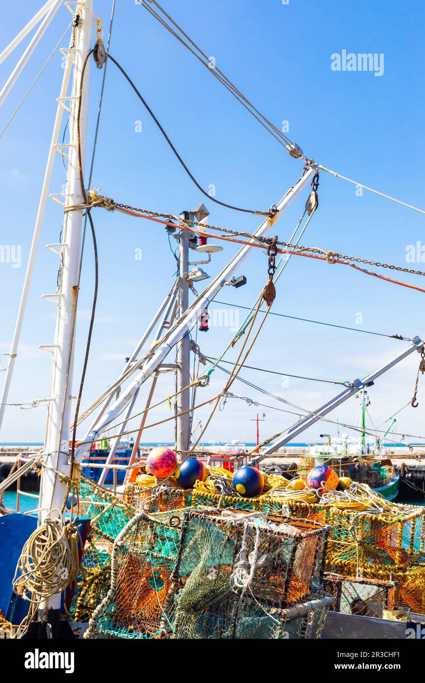 Crayfish nets and traps on a small fishing boat Stock Photo - Alamy
