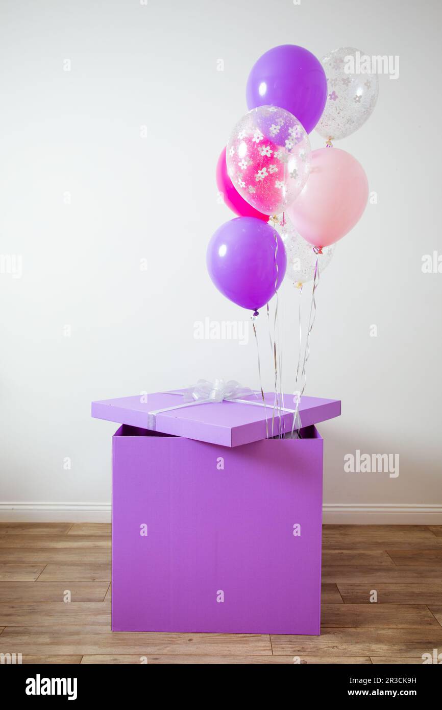The extremely huge birthday present in the room Stock Photo - Alamy