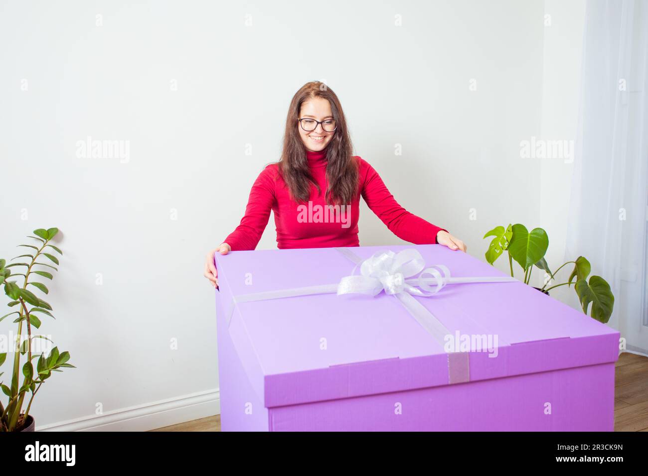 Present huge box woman hi-res stock photography and images - Alamy