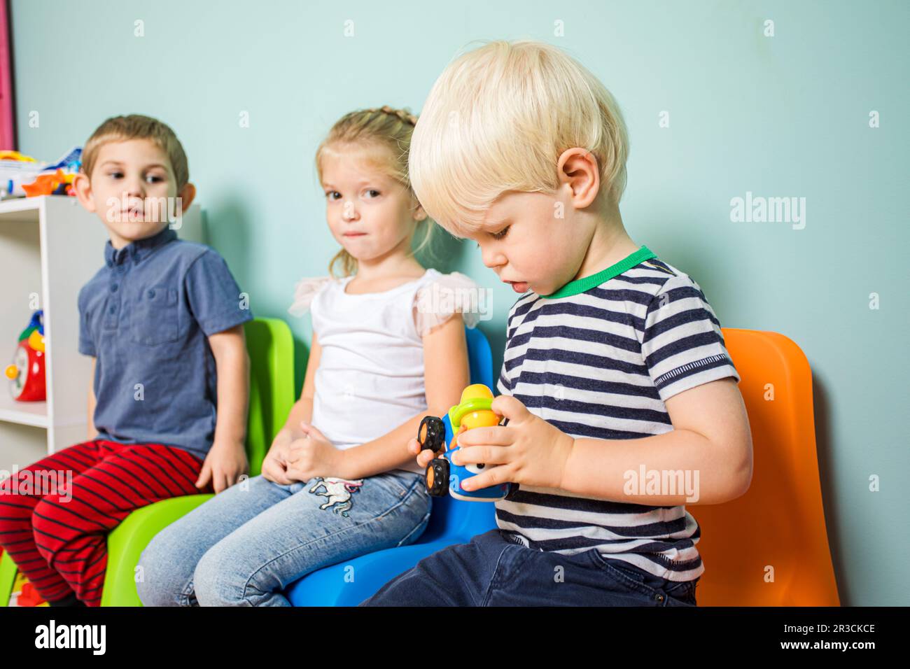 The children watch each other with interest in the kindergarten Stock ...