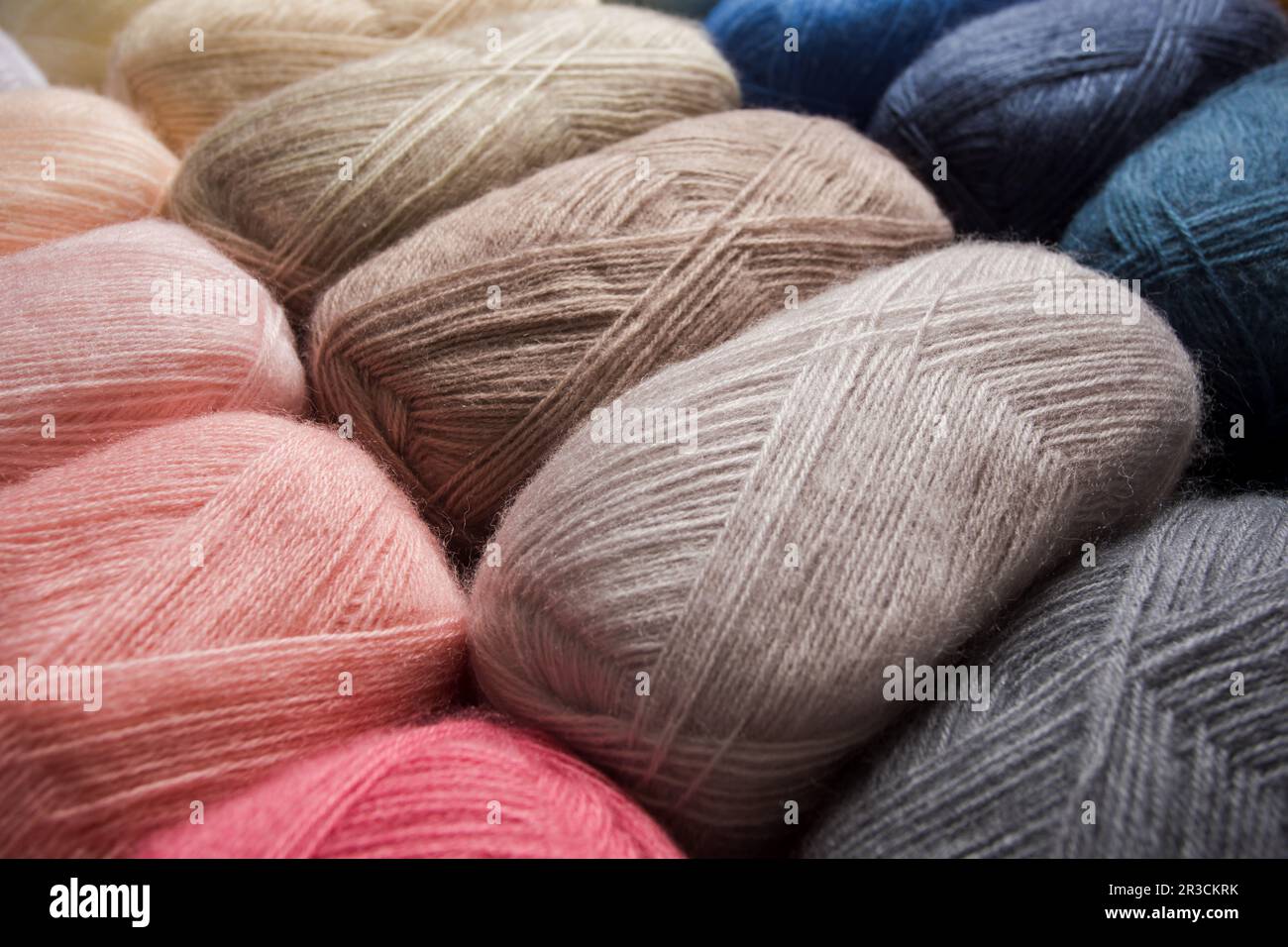 The sewing threads in gentle colors that are folded into a pile Stock ...