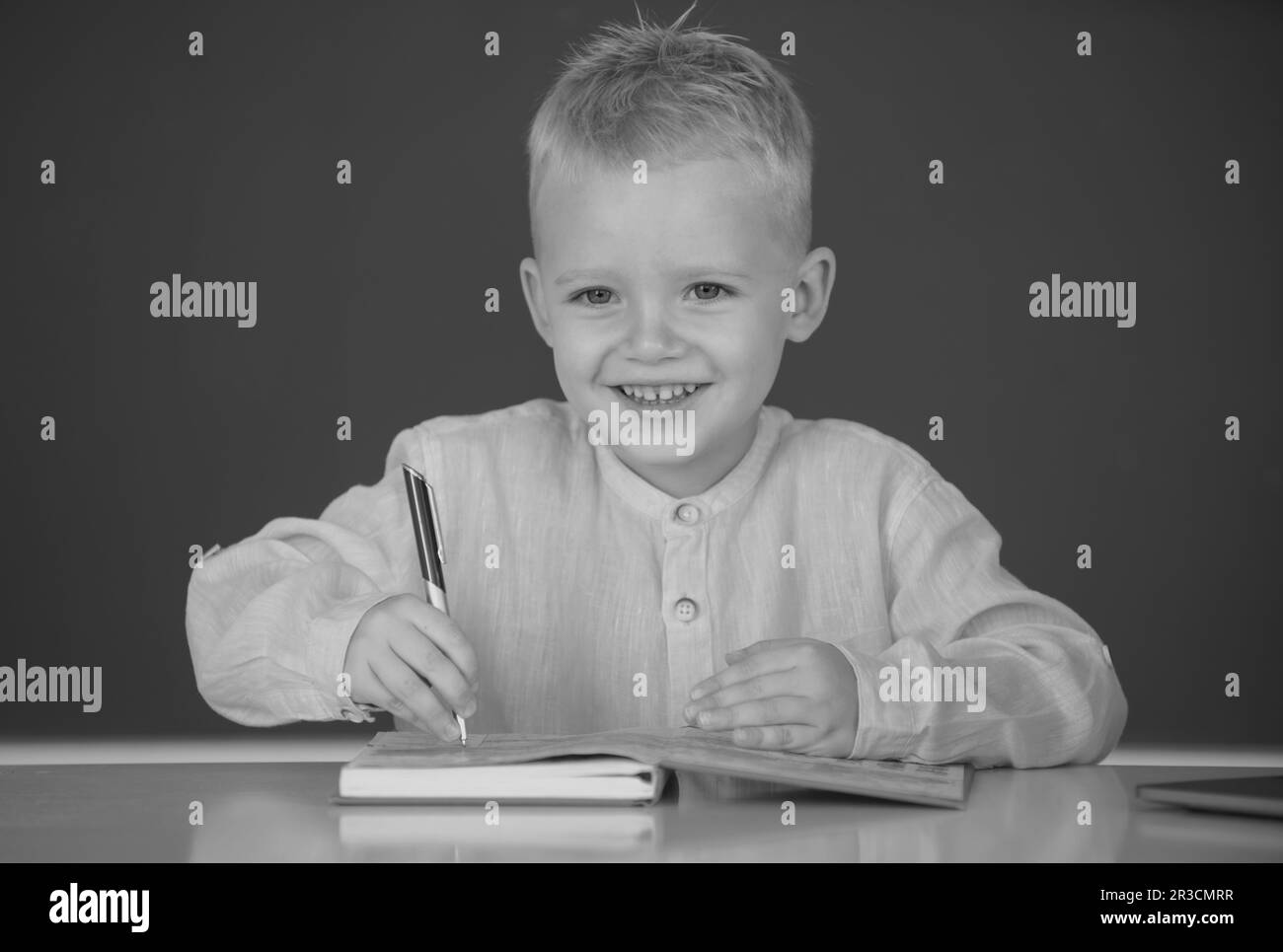 School boy studying math on lesson in classroom at elementary school ...