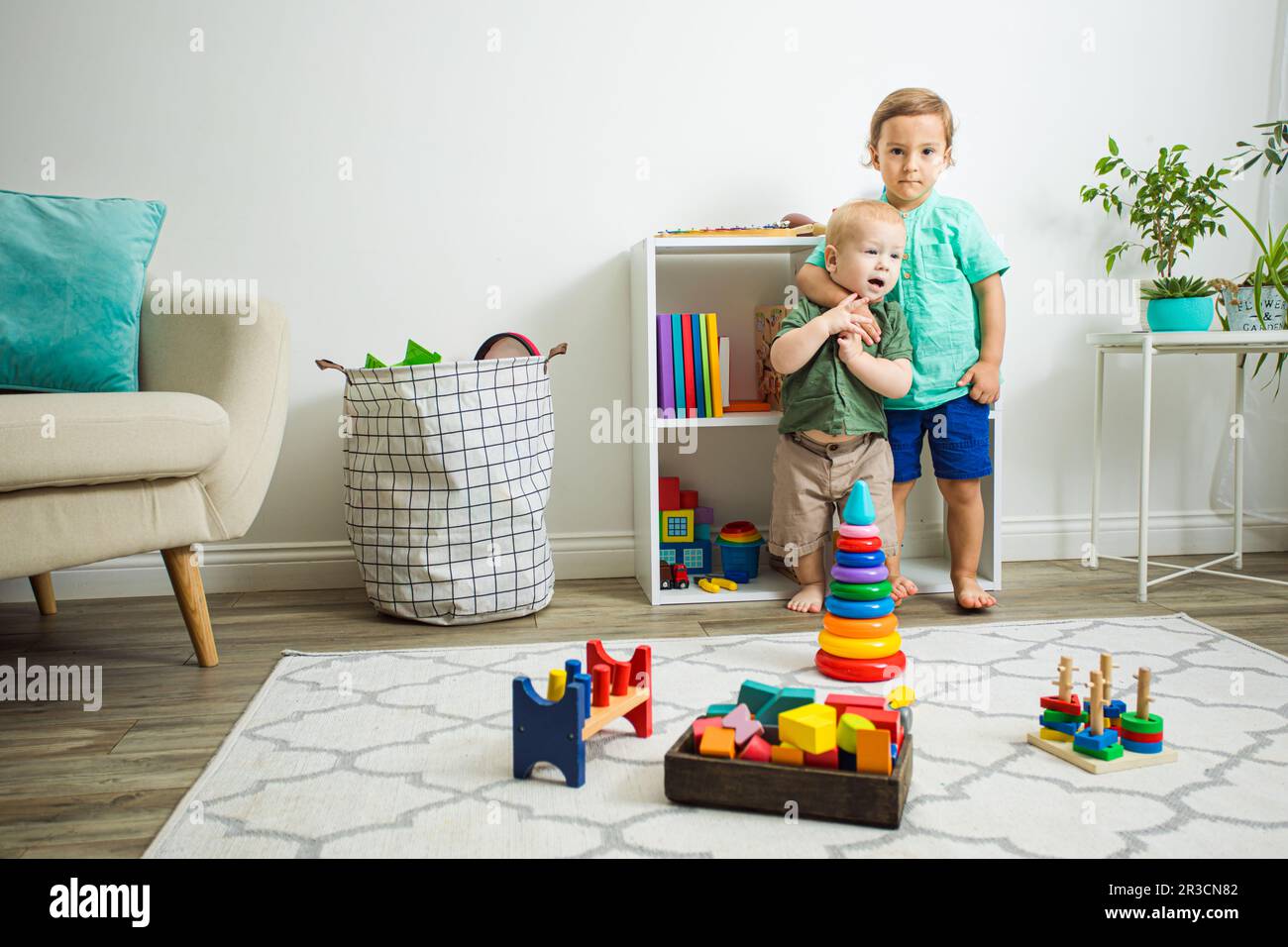 It is hard for boy to get used to be a big brother Stock Photo - Alamy