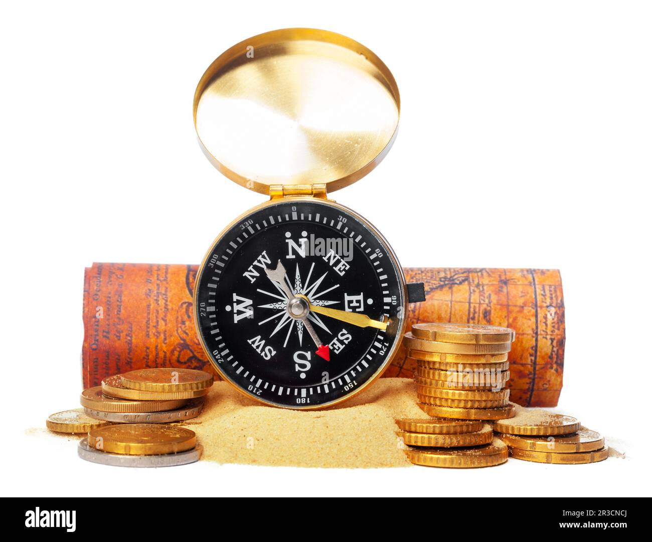 stacking coins with compass .money saving concept Stock Photo - Alamy