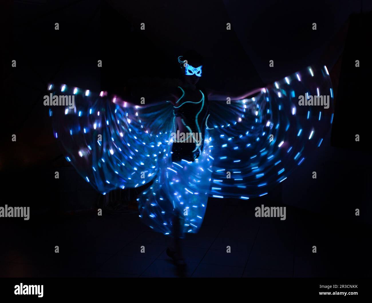 Light and dance show is magical in dark Stock Photo - Alamy