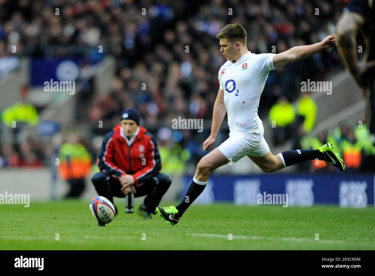 Owen Farrell of England takes a penalty kick in front of Mike Catt ...