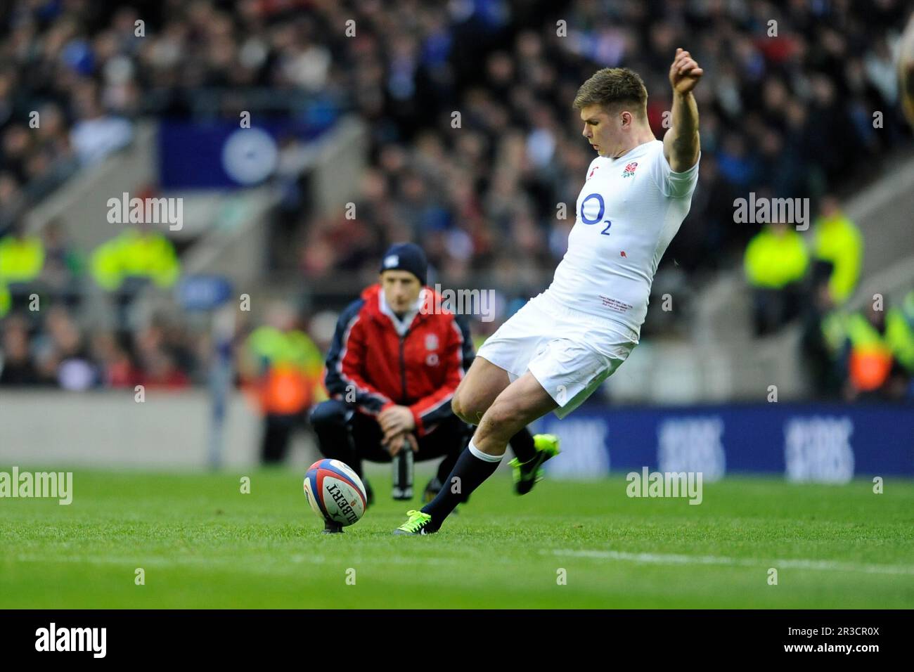 Owen Farrell of England takes a penalty kick in front of Mike Catt ...