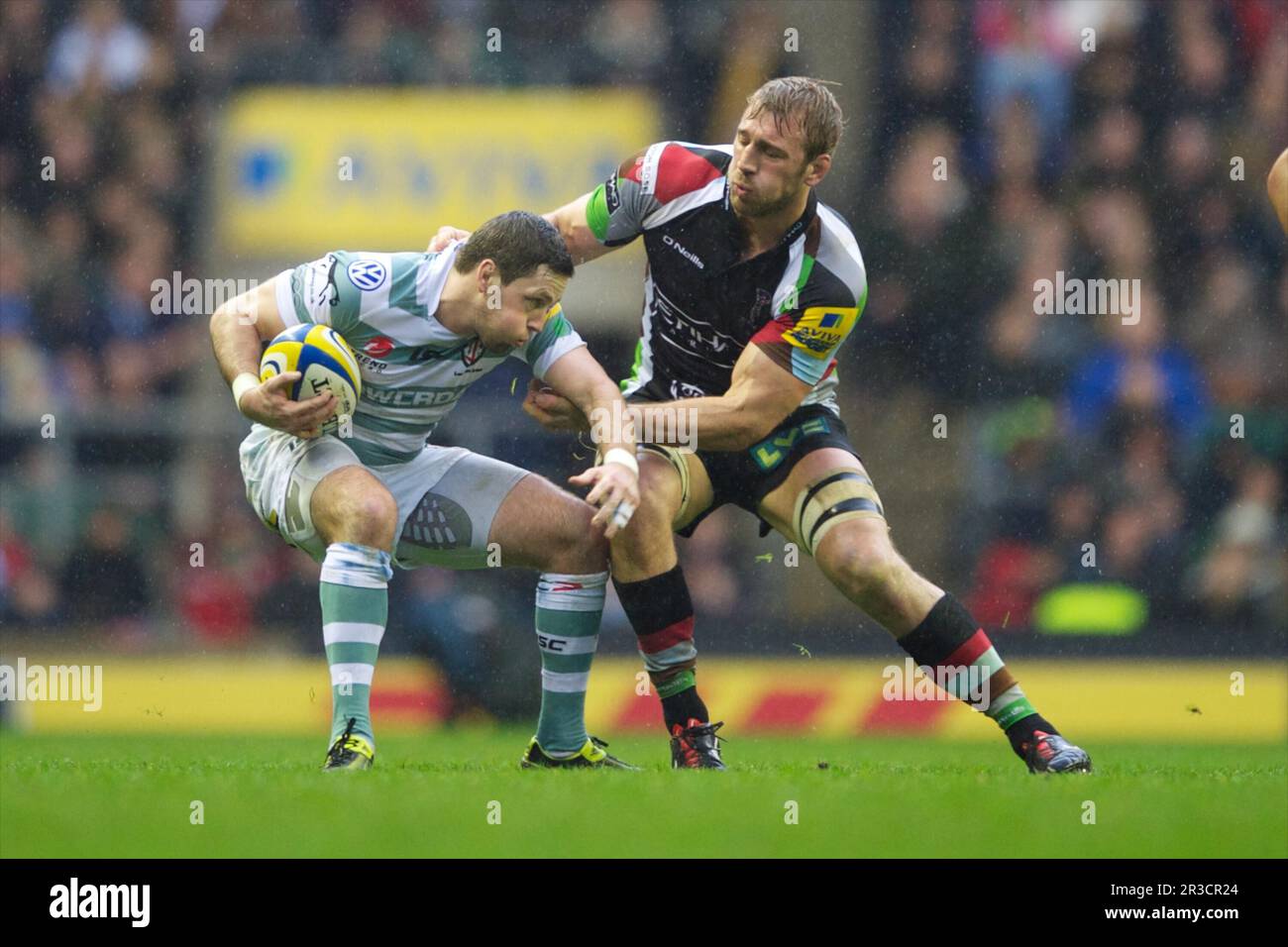 Darren Allinson of London Irish is caught by Chris Robshaw of ...