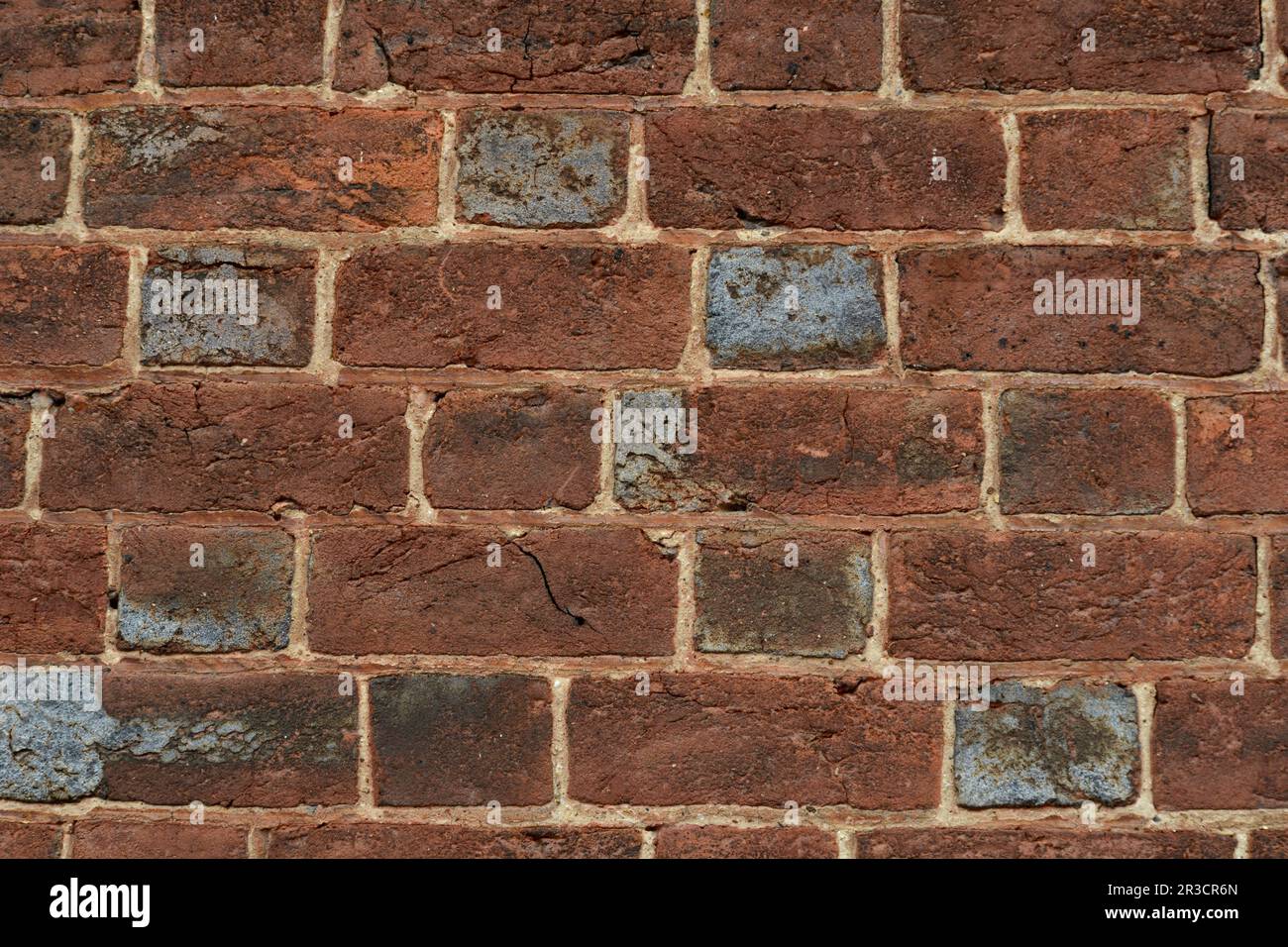A closeuup of the brick facade of a 19th century home in the historic ...