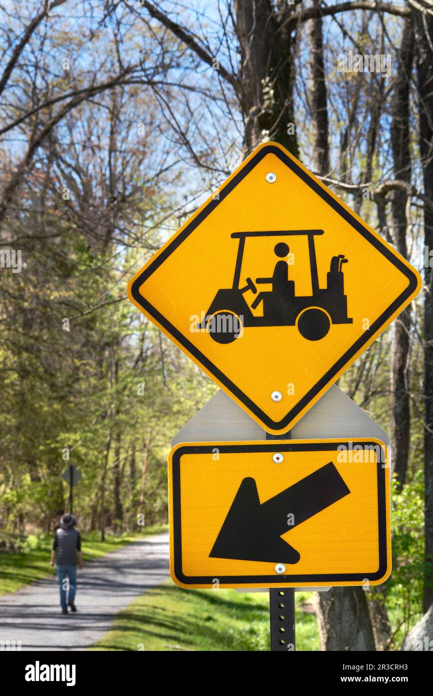 A sign identifies a golf cart path at a country club in Abingdon ...