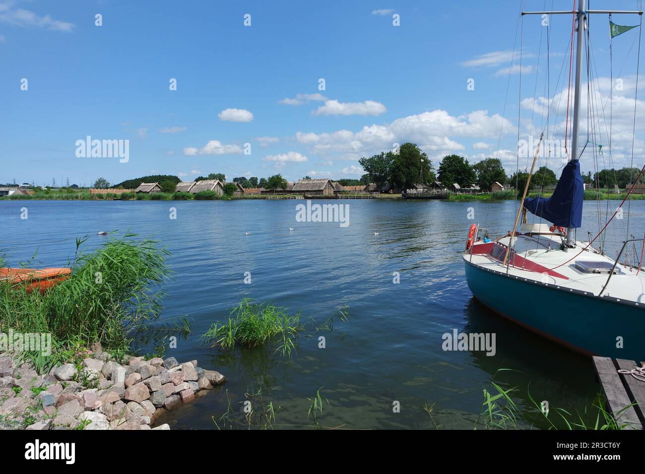 Western Pomeranian sailing route. Boat in front of Wolin Stock Photo ...