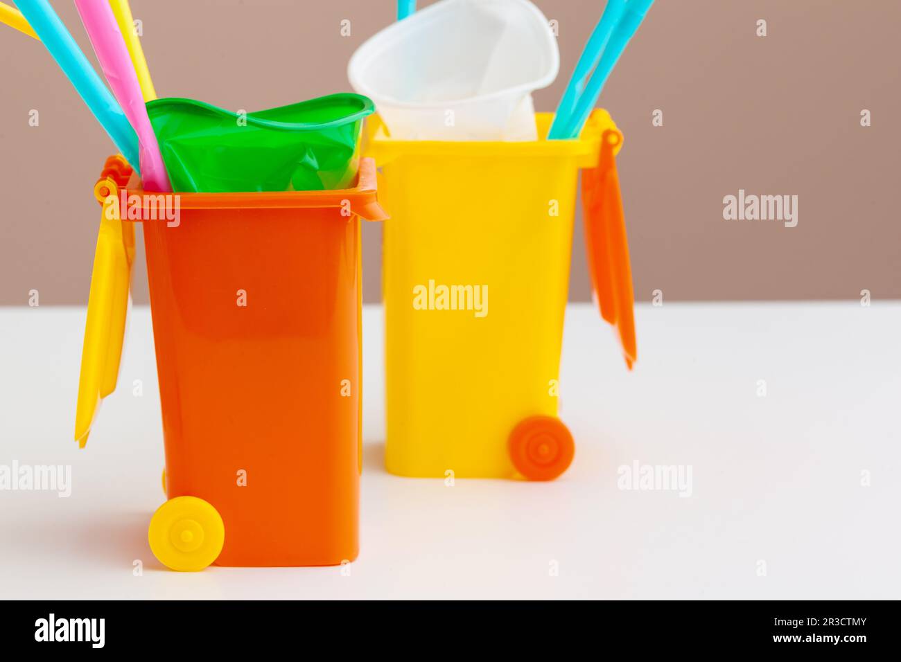 trash bins and assorted garbage, irecycle concept Stock Photo - Alamy