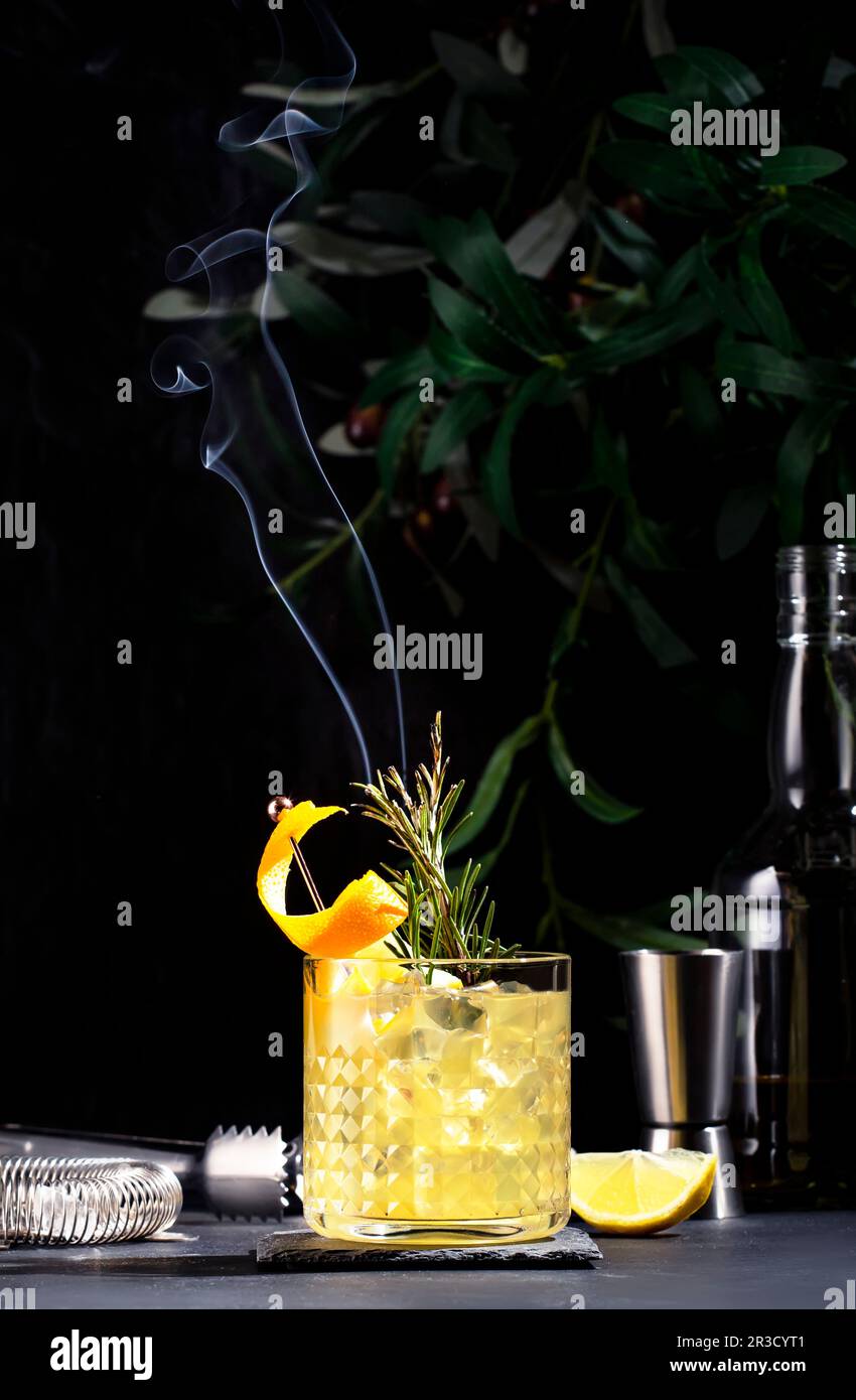 Penicillin cocktail drink with scotch, whiskey, syrup, lemon juice and ...