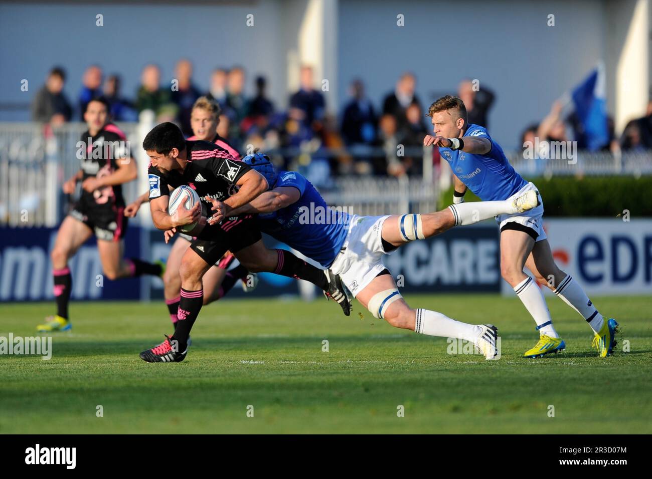 Paul Williams of Stade Francais is tackled by Rhys Ruddock of Leinster ...