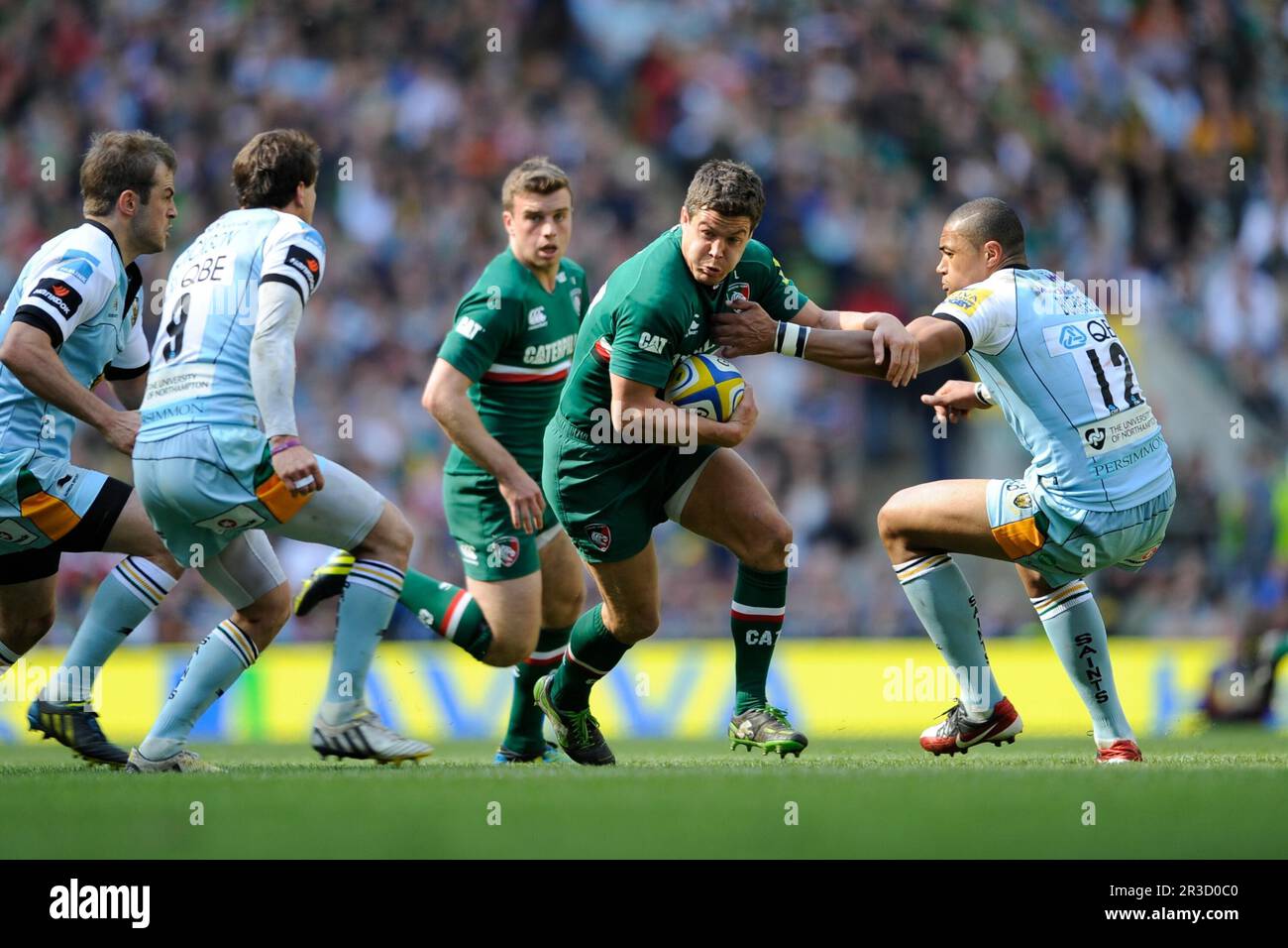 Anthony Allen of Leicester Tigers forces his way past Luther Burrell of ...