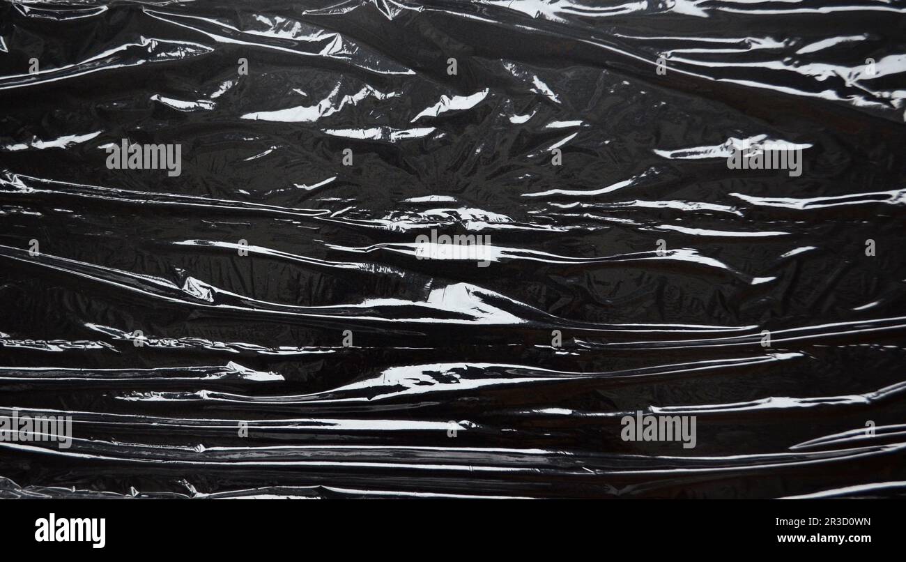 Plastic wrap texture for overlay. wrinkled stretched plastic effect. transparent plastic wrap on ...