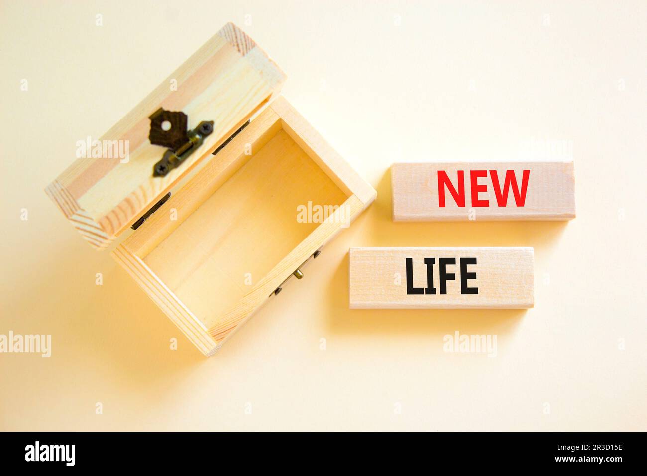 New life symbol. Concept words New life on wooden blocks on a beautiful ...
