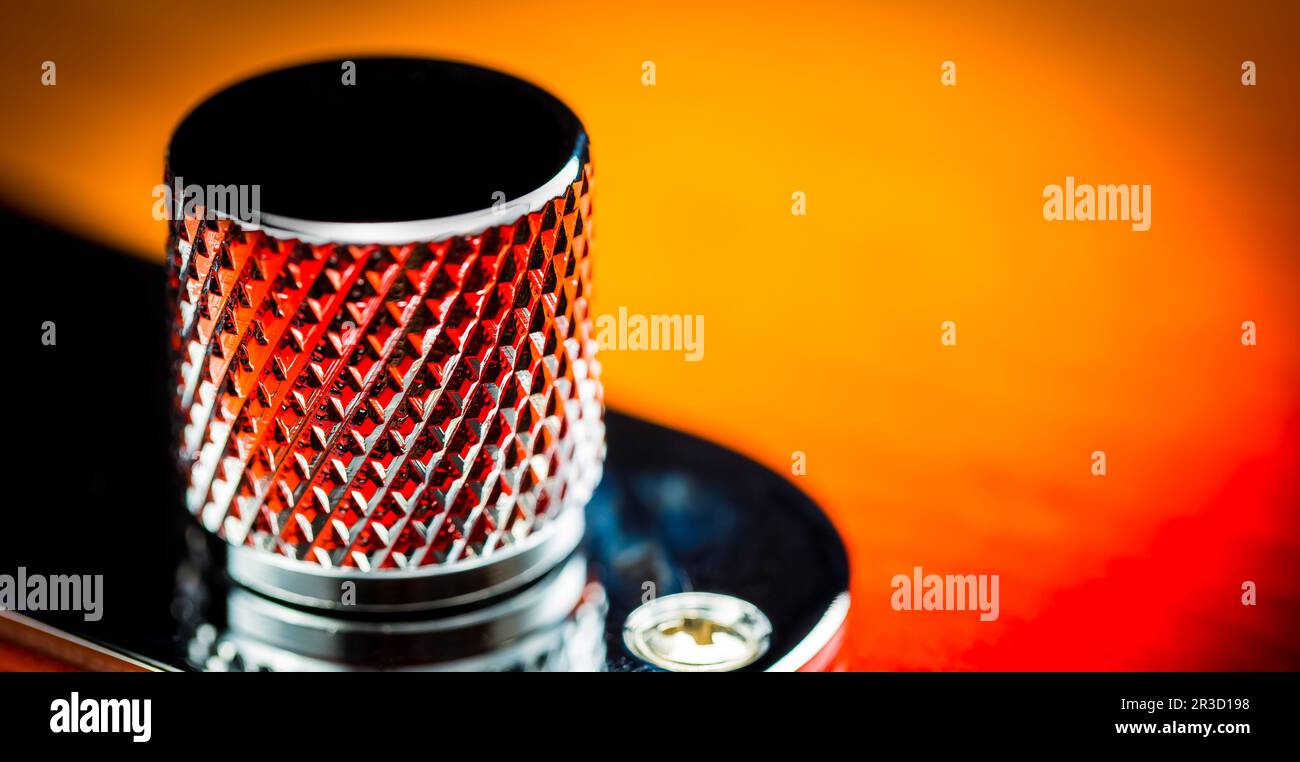 Macro close up of an electric guitar volume knob with interesting ...