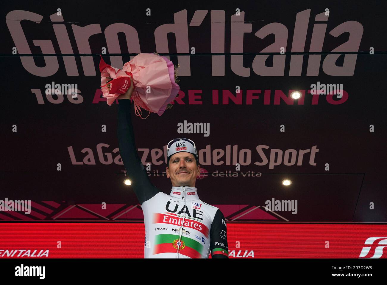 Portugal's Joao Pedro Almeida celebrates on podium after winning the ...