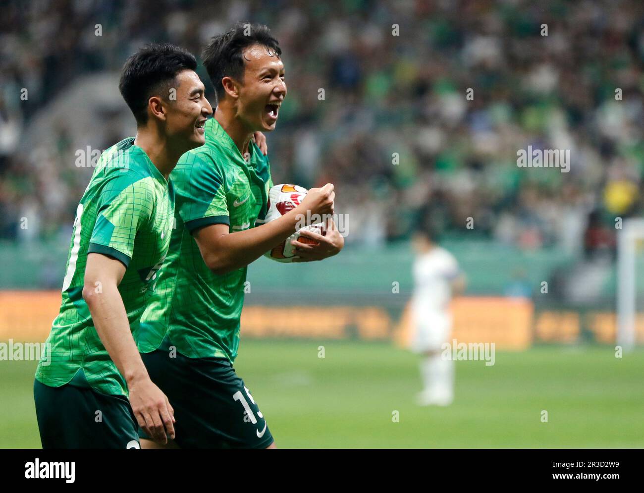 Beijing, China. 23rd May, 2023. Beijing Guoan's Gao Tianyi (R ...