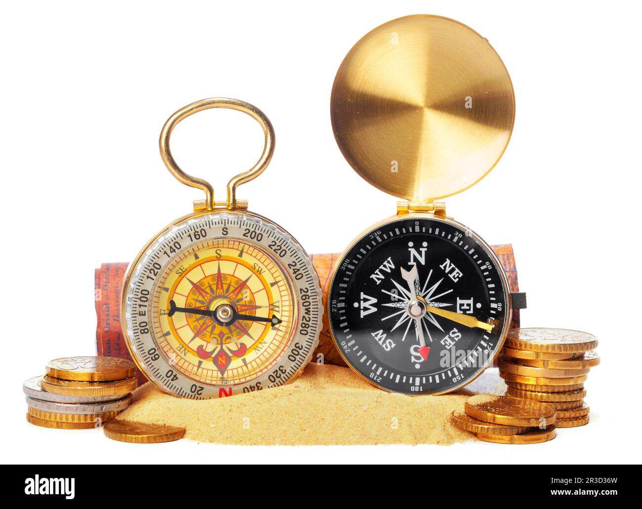 stacking coins with compass .money saving concept Stock Photo - Alamy