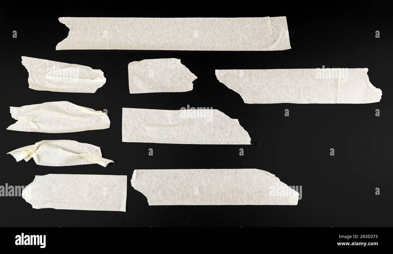Set of various adhesive tape pieces on black background Stock Photo - Alamy