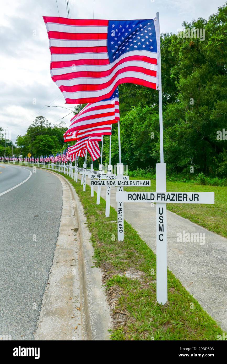 American flags and crosses celebrate the memory of those who have ...