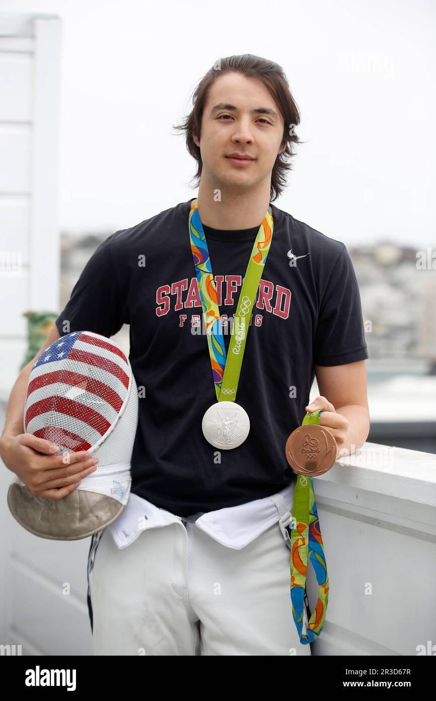 Alexander Massialas stands for a portrait with his Olympic gold medal ...