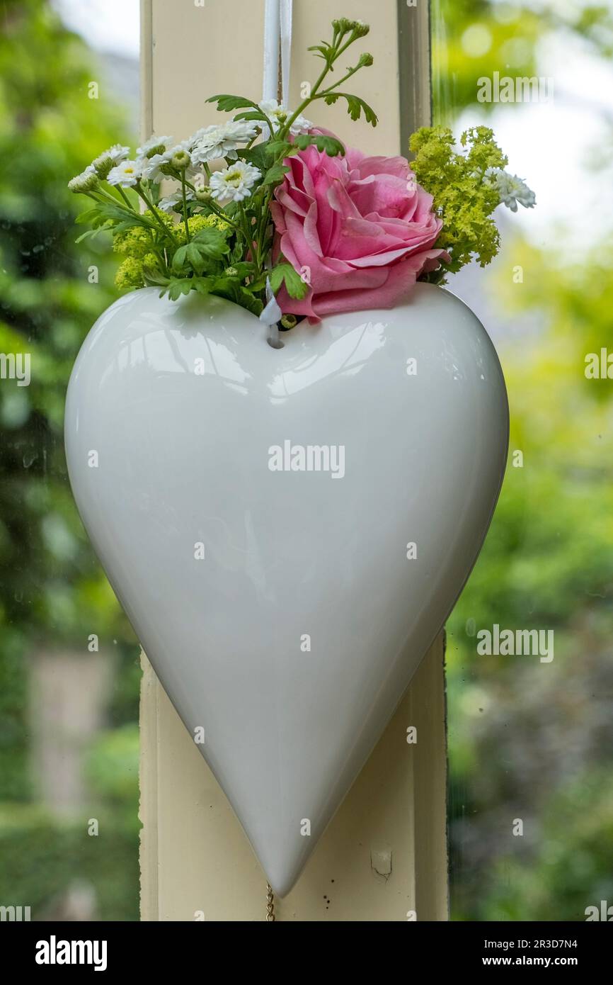 Heart with flower decoration Stock Photo - Alamy